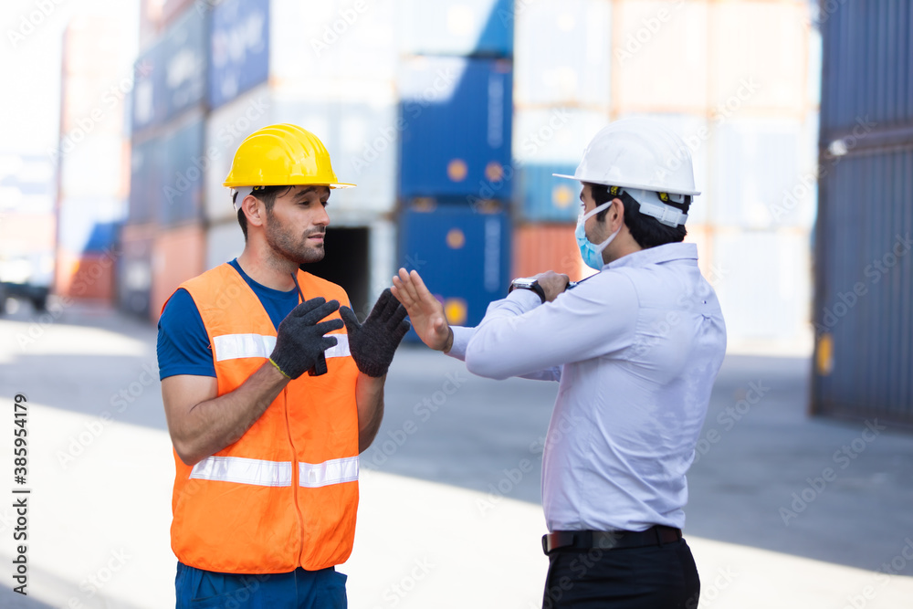 Foreman ask man worker put on face mask protect coronavirus. Man worker ...