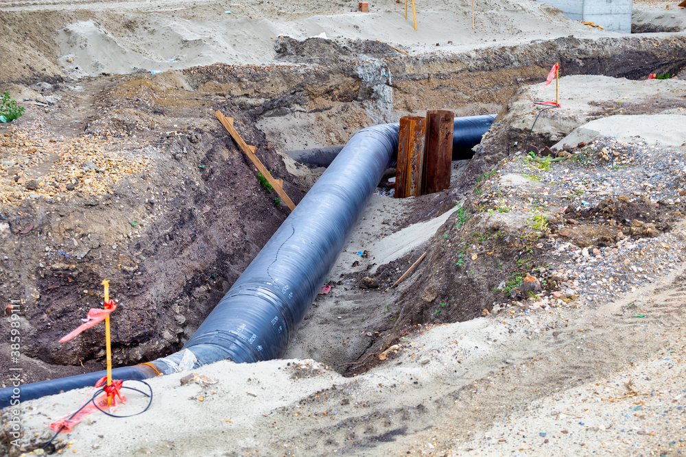 Installing underground steam piping systems Stock Photo | Adobe Stock