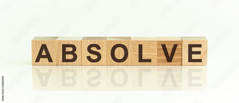 Wooden Blocks with the text: Absolve. The text is written in black ...