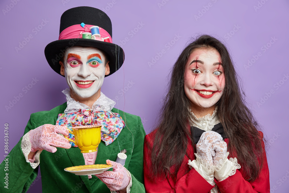 Holiday traditions celebration and party concept. Halloween couple in ...