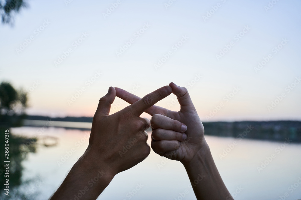 Couple making infinity symbol Stock Photo | Adobe Stock