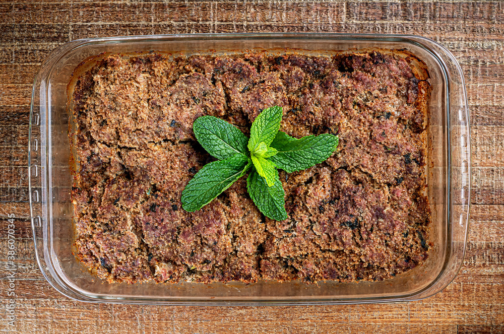 Roasted kibe in the glass bowl with mint, garlic and onion. Brazilian ...