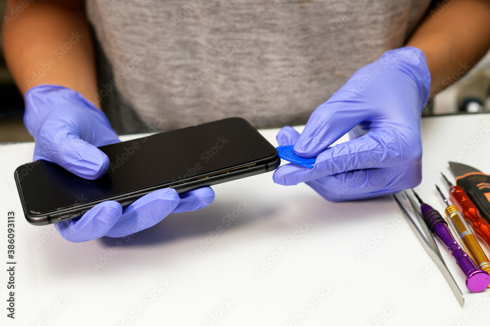 Close-up photos showing process of mobile phone repair.Mobile phone ...