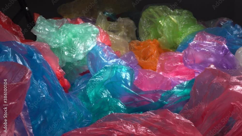 Old plastic bags, wrap, film. Plastic packaging waste. Disposable ...