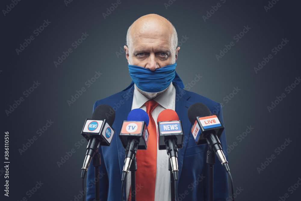 Angry politician with sealed mouth at the press conference Stock Photo ...