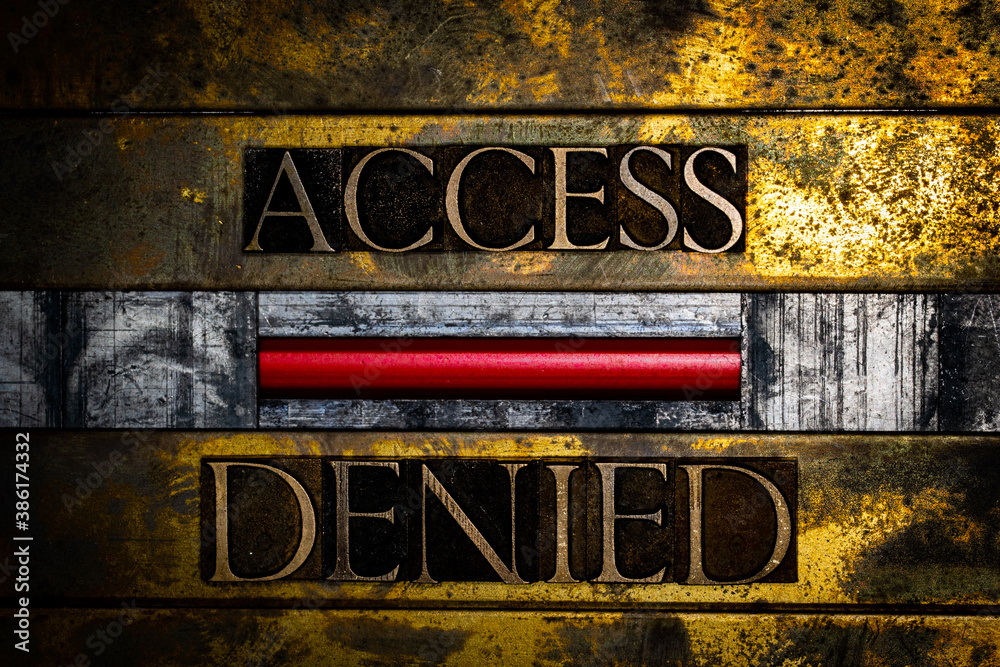 Access Denied text message with red warning sign on vintage textured ...