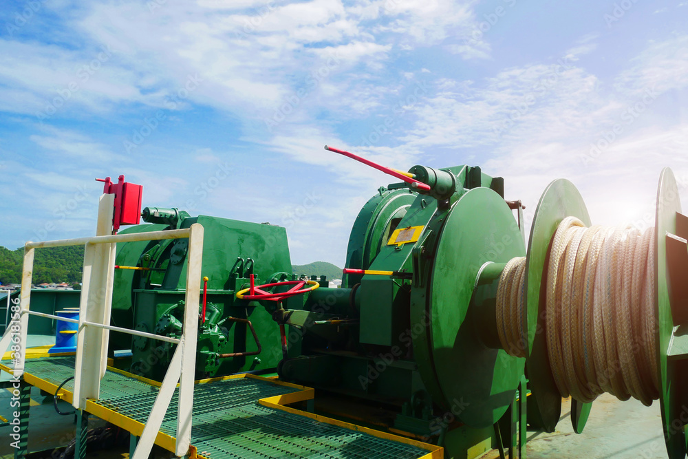 Green Mooring winch, Mooring windlass of large ship with winch rope in ...