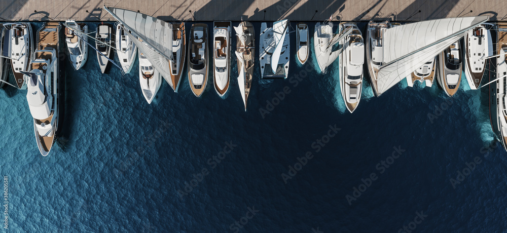 Aerial view of the yacht club. Aerial top-down view of docked sailboats ...