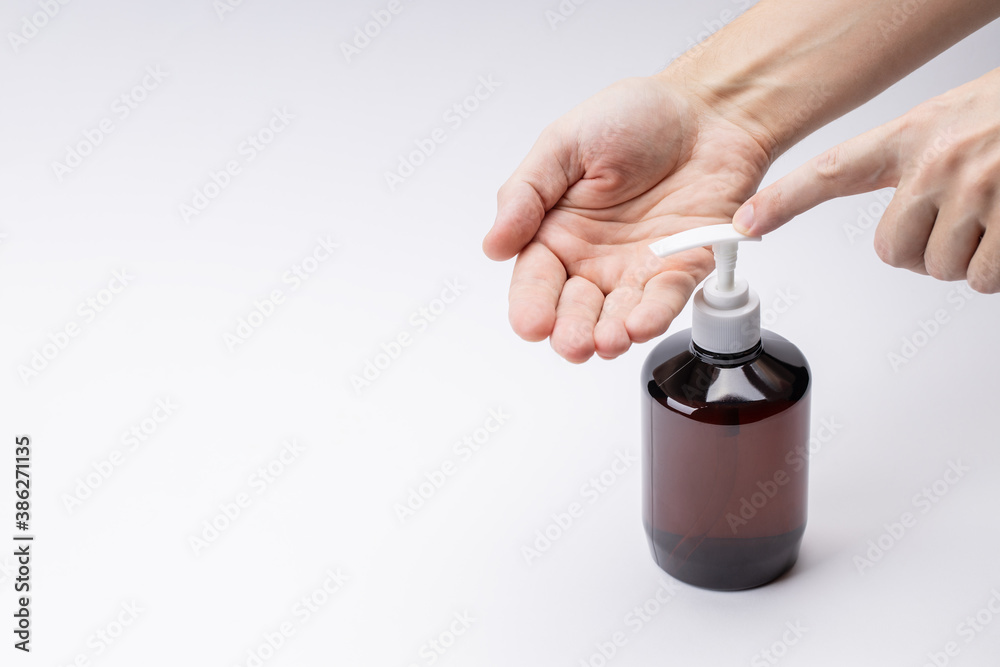 caucasian person applying soap for washing hands. hygiene concept ...