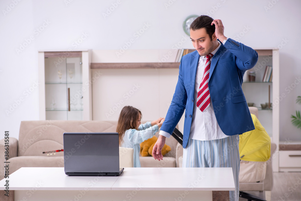 Young divorced father of two children working from house Stock Photo ...