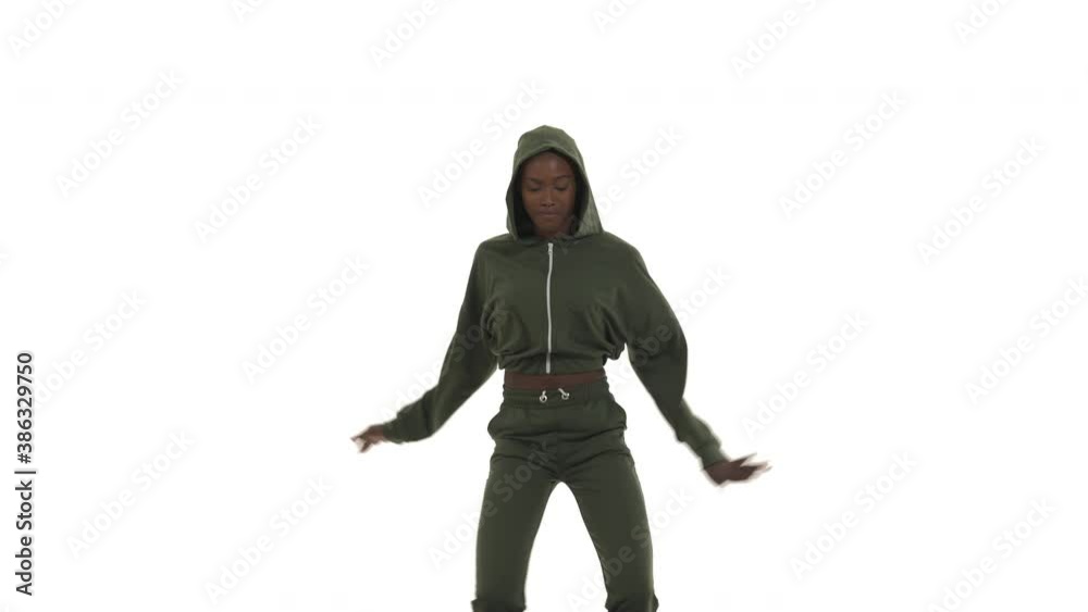 African American woman in hood dancing in afro street dance style ...