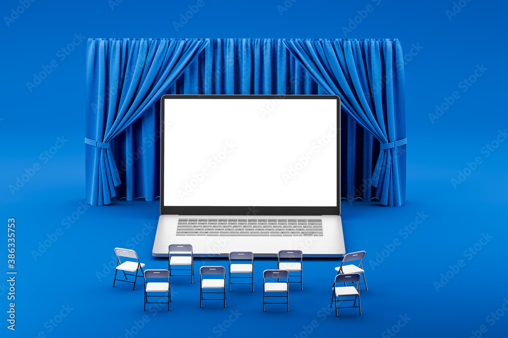 Chairs in front of laptop screen against blue theater curtain ...