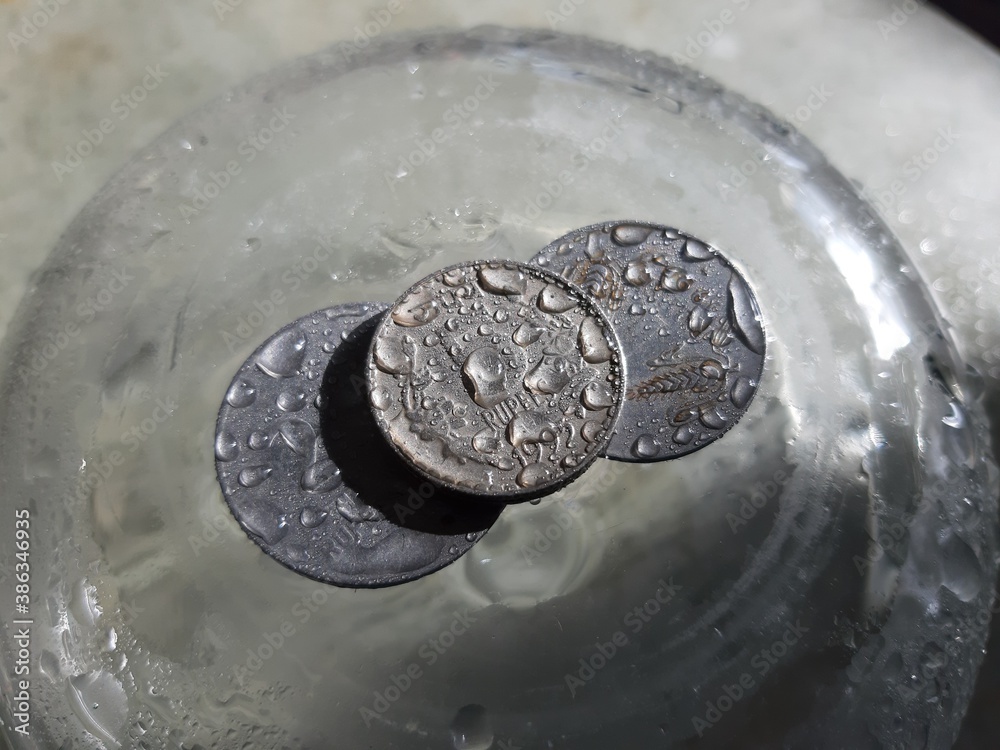 Picture of water droplets over Indian Five Rupee Coin Stock Photo ...