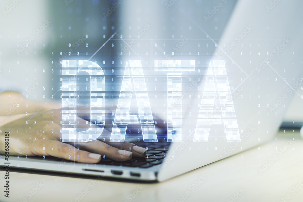 Creative Data word sign and hands typing on laptop on background ...