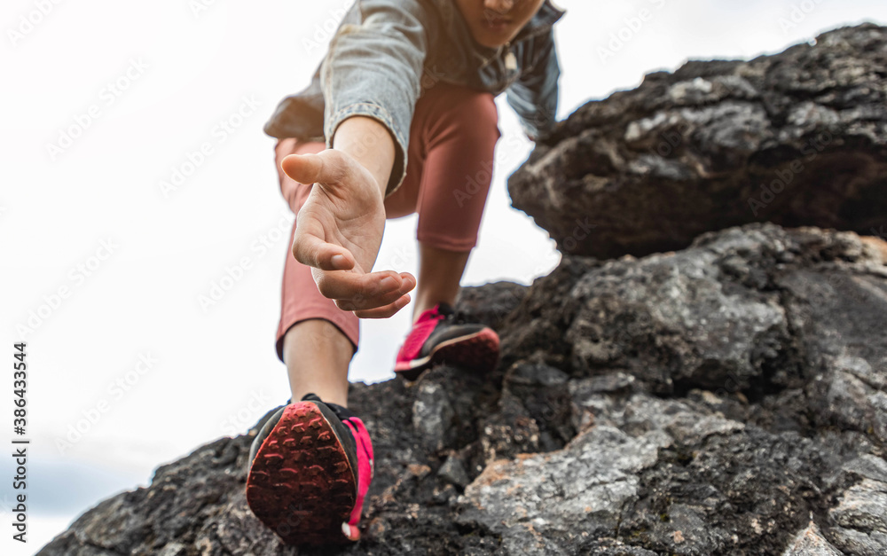 Giving a helping hand, Hands reaching out to help each other. Stock ...