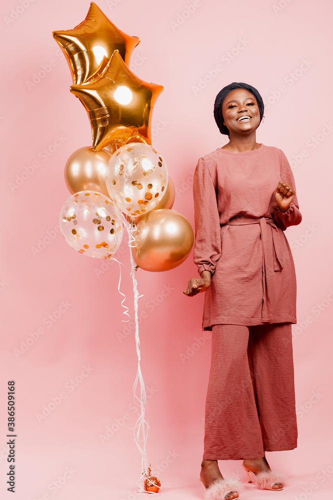 Eid al-Adha celebration. Muslim national holiday. Attractive girl with ...