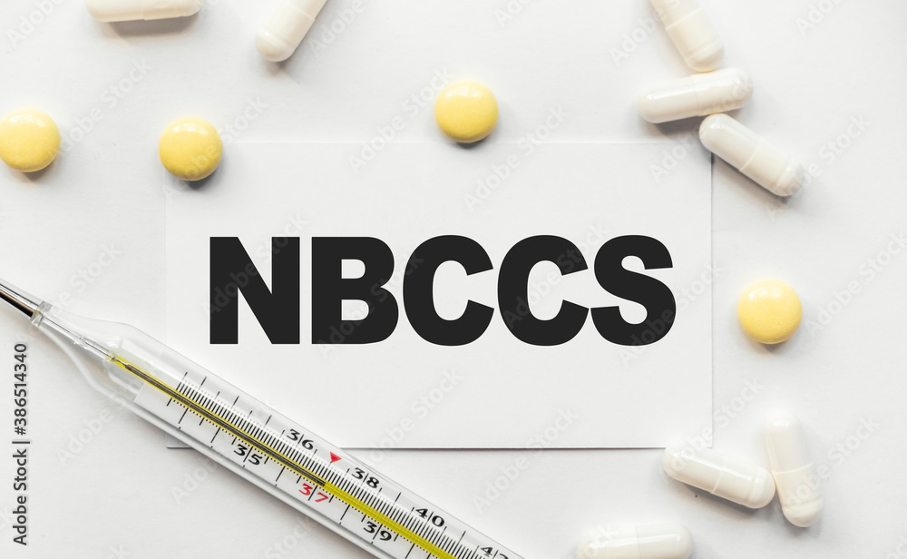 On white business card the inscription NBCCS Nevoid basal cell ...