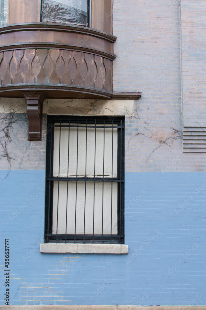 Old Chicago architecture; bay window with copper surround above double ...