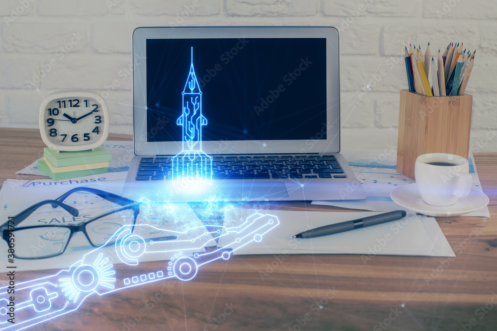 Desktop computer background in office and start up theme hologram ...