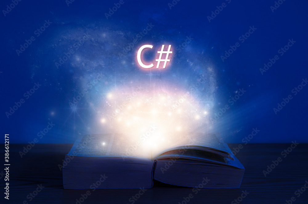 Open book with c# inscription. Light coming from open book with words c ...
