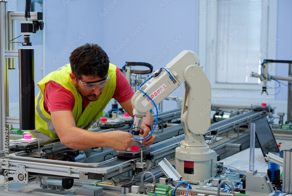 Close-up of Service Engineer ( Mechanic ) with safety glasses ...