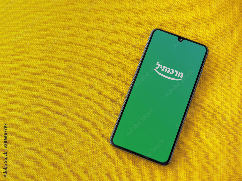 Bank Mercantil Discount app launch screen with logo in hebrew text on ...