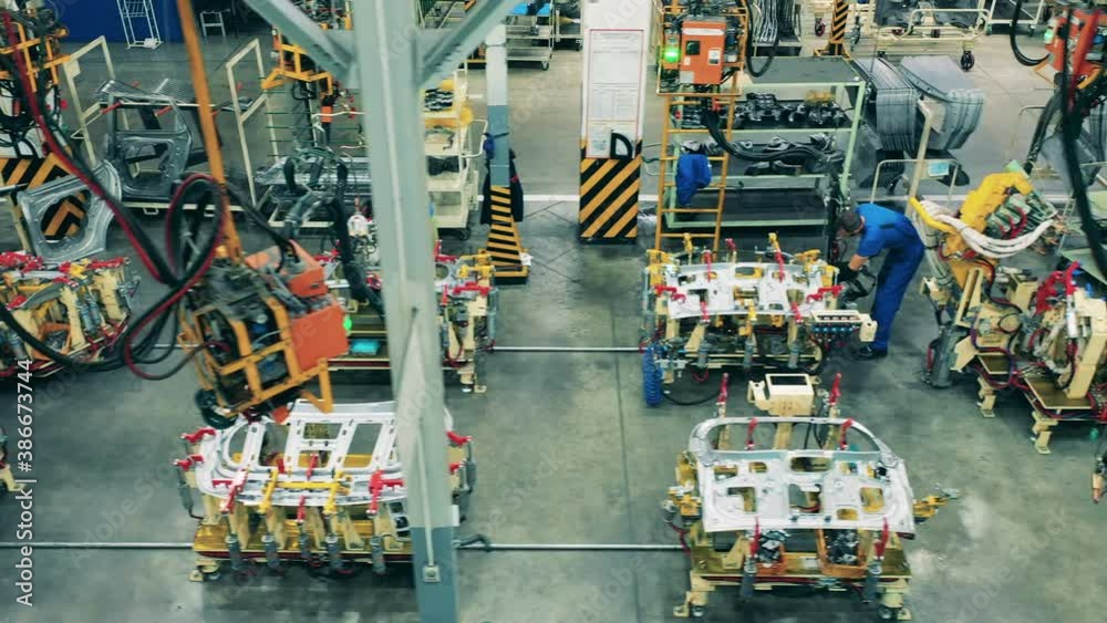 Unit of a car-producing factory in a top view. Car assembly line ...