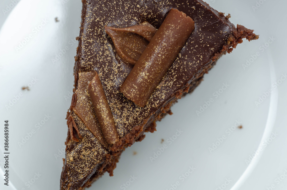 Digestive biscuit base with chocolate cheesecake and pockets of salted ...