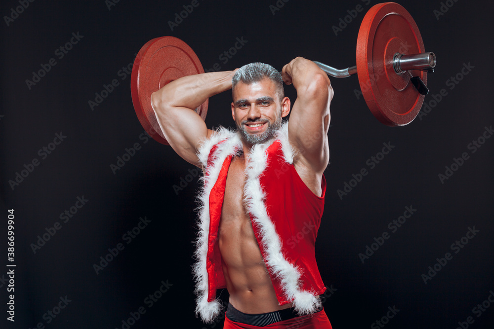 Sexy Santa Claus. Bodybuilder young handsome santa clause smile train ...