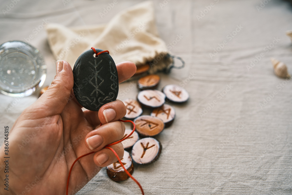 rune stone good luck and riches talisman with runescript Stock Photo ...