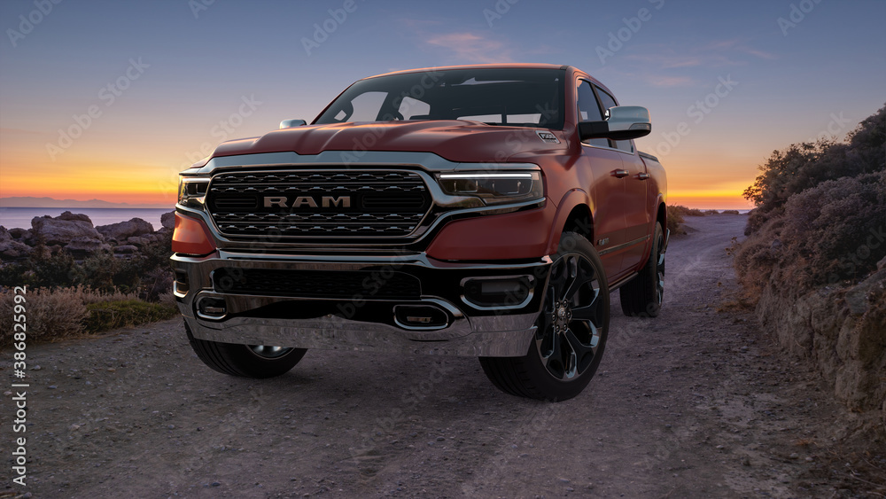Foto de Dodge RAM 1500 driving a scenic road by the sea during a ...