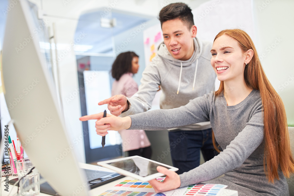 Web designers from the start-up team are happy Stock Photo | Adobe Stock