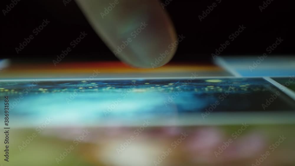 Close up Macro Man Browsing Tablet Computer With Finger. Person Using ...