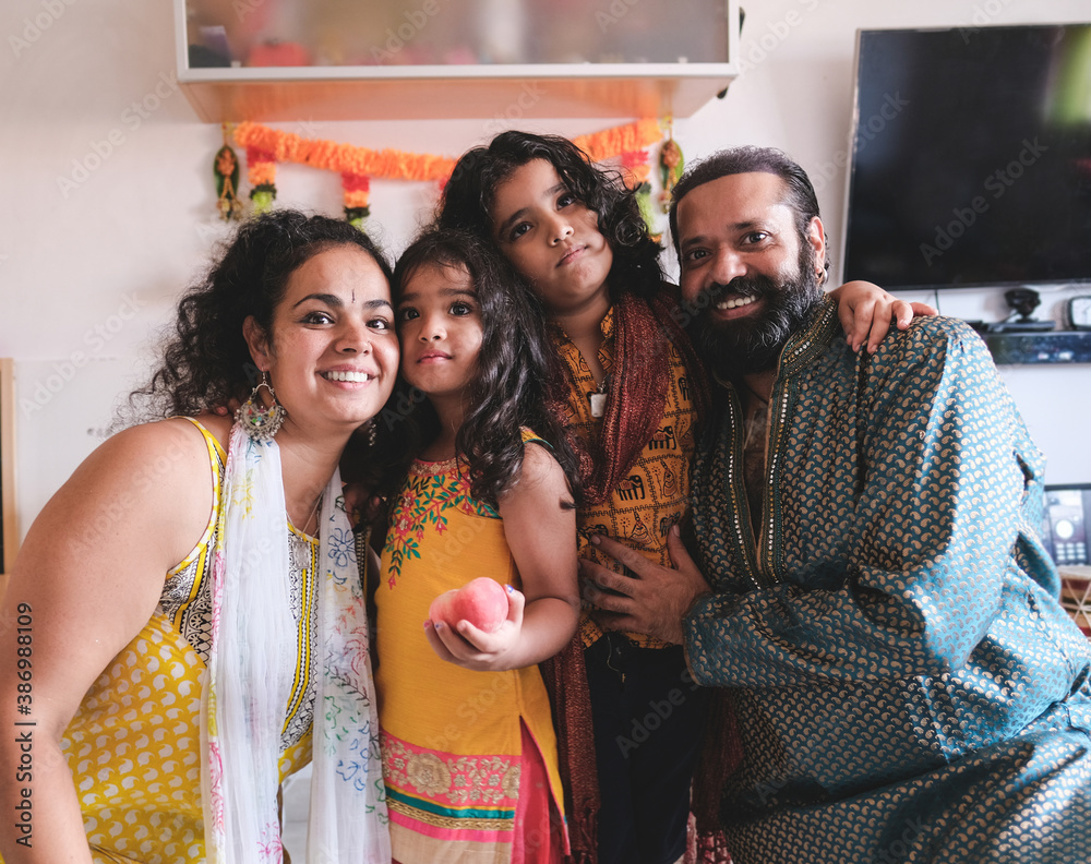 Portrait of happy indian family - Parents and children celebrate hindu ...