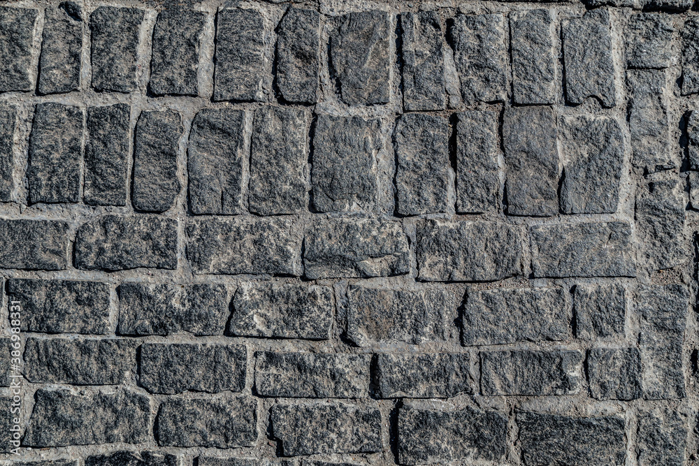 Old paving stone mosaic pattern. Pavement texture. Gray cobblestone ...