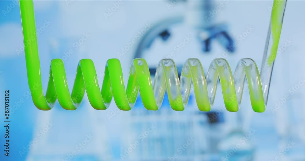 The liquid changing color from green to yellow acid color moves along ...