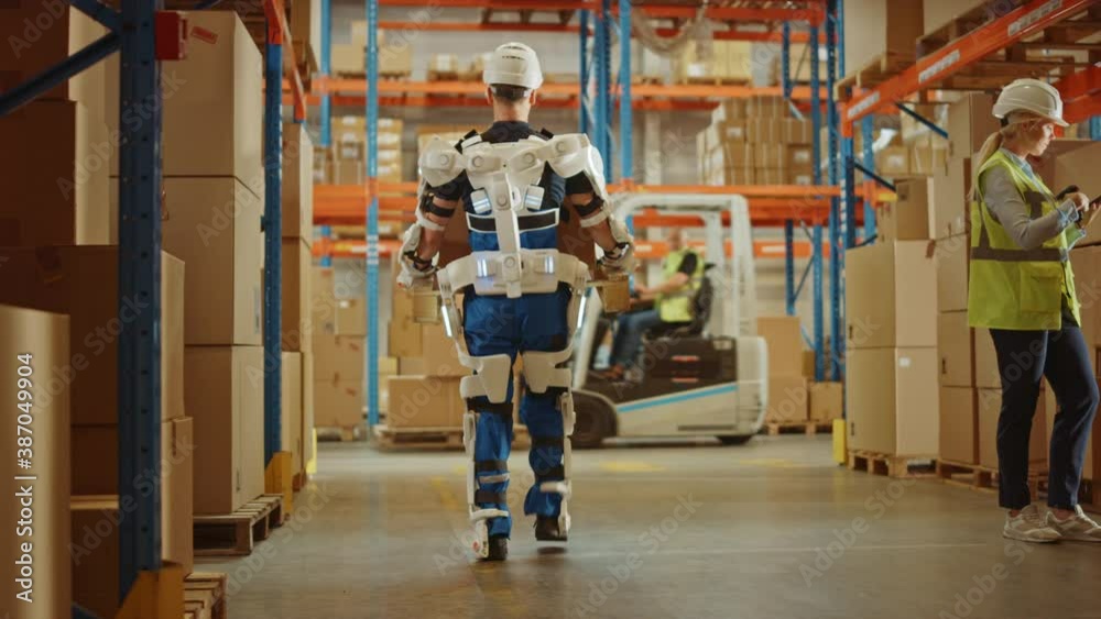 High-Tech Futuristic Warehouse: Worker Wearing Advanced Full Body ...