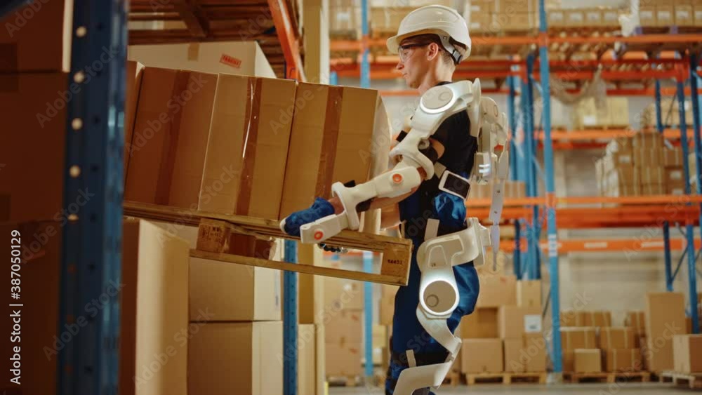 High-Tech Futuristic Warehouse: Worker Wearing Advanced Full Body ...