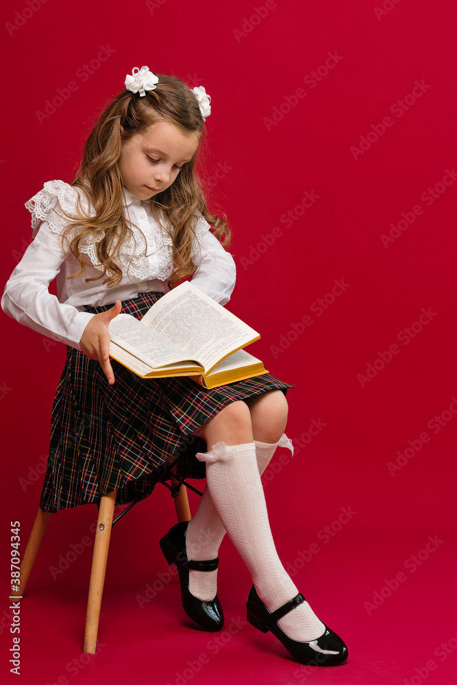 Full Length Portrait Preteen Schoolgirl On Vivid Red Colored Background