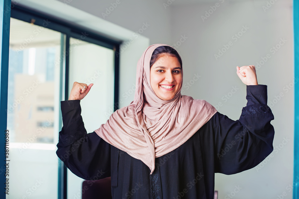 Strong independent Muslim woman showing her power while wearing abaya ...