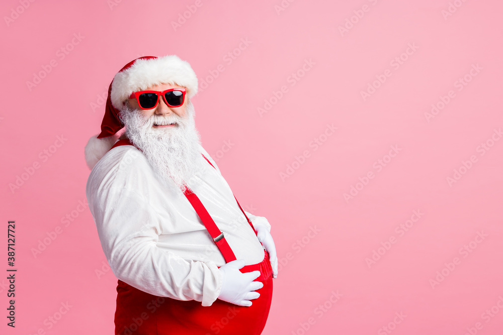 Profile side photo of funny fat santa claus touch his big belly enjoy x ...