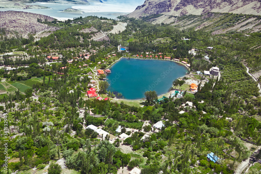 landscape of lake with mountains, aerial view of shangrila resort in ...