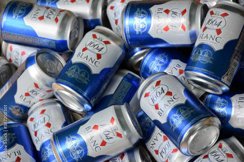 Blanc logo on beer cans in big pile. 1664 Blanc is the wheat beer from ...