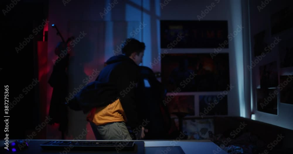 Angry and desperation reaction of a teenager losing in a digital game ...