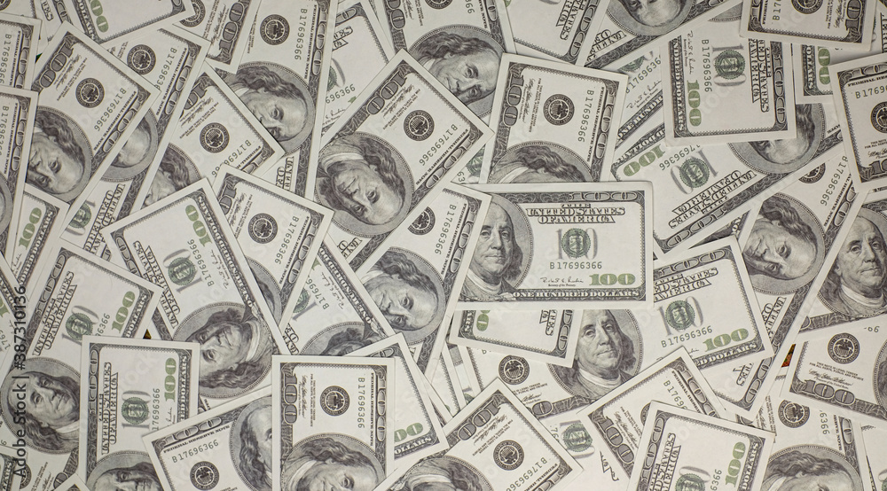 Group of money stack of 100 US dollars banknotes a lot of the ...