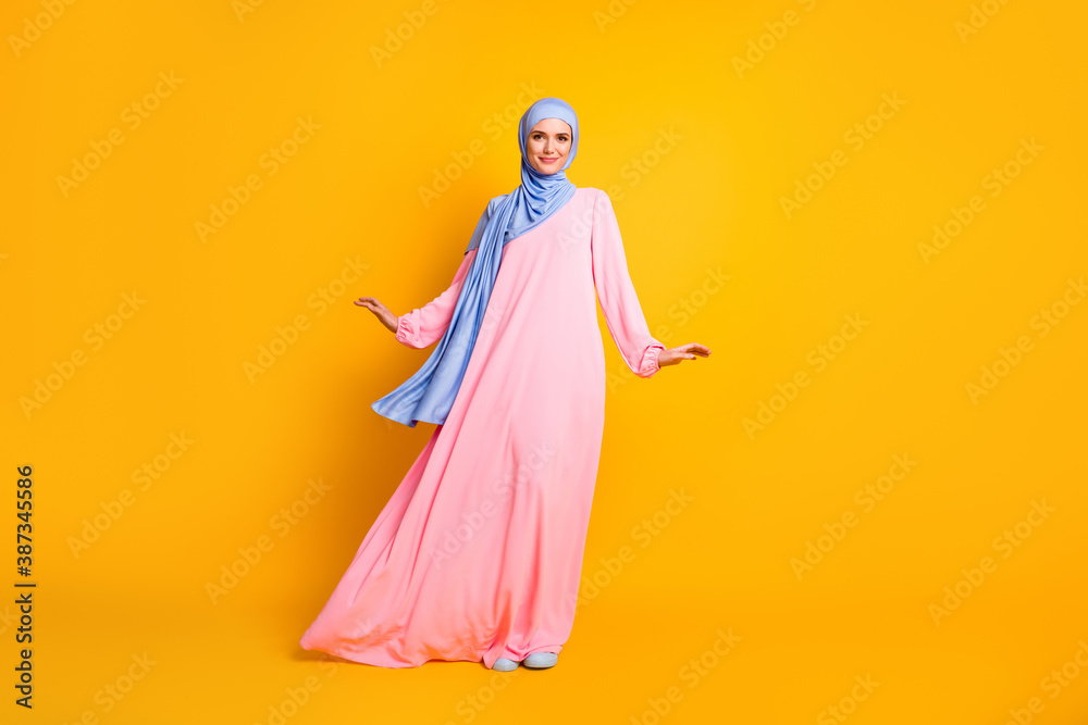Full length body size view of nice lovely cheery feminine muslimah ...