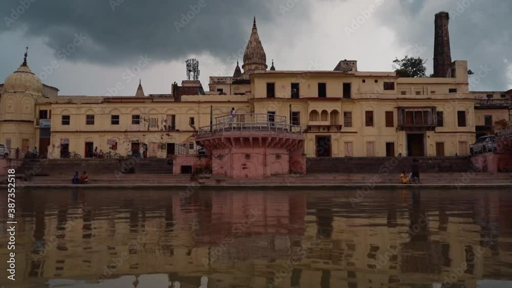 Panoramic View Of Temple Reflection By The Calm Water Of Sarayu River ...