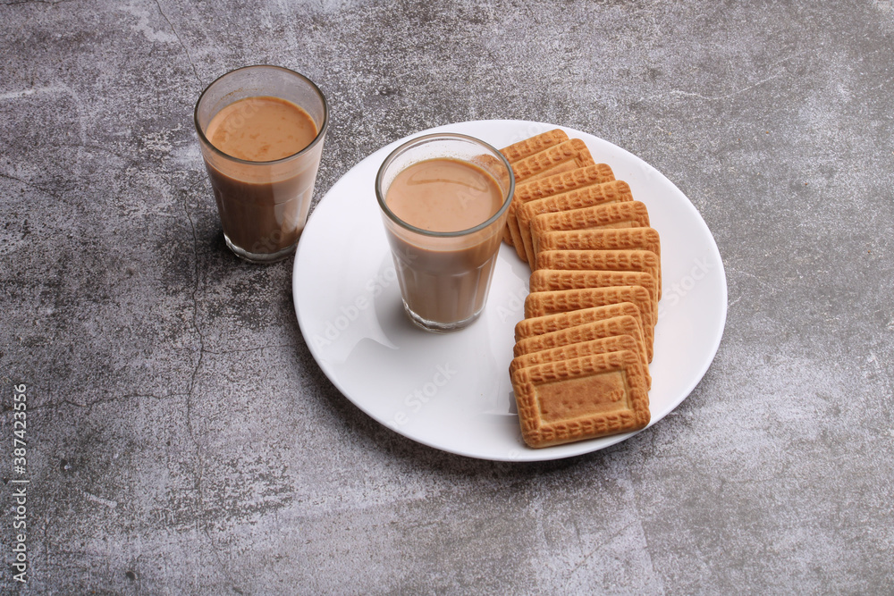 Cutting Chai, Traditional Desi Roadside tea of india with biscuits ...