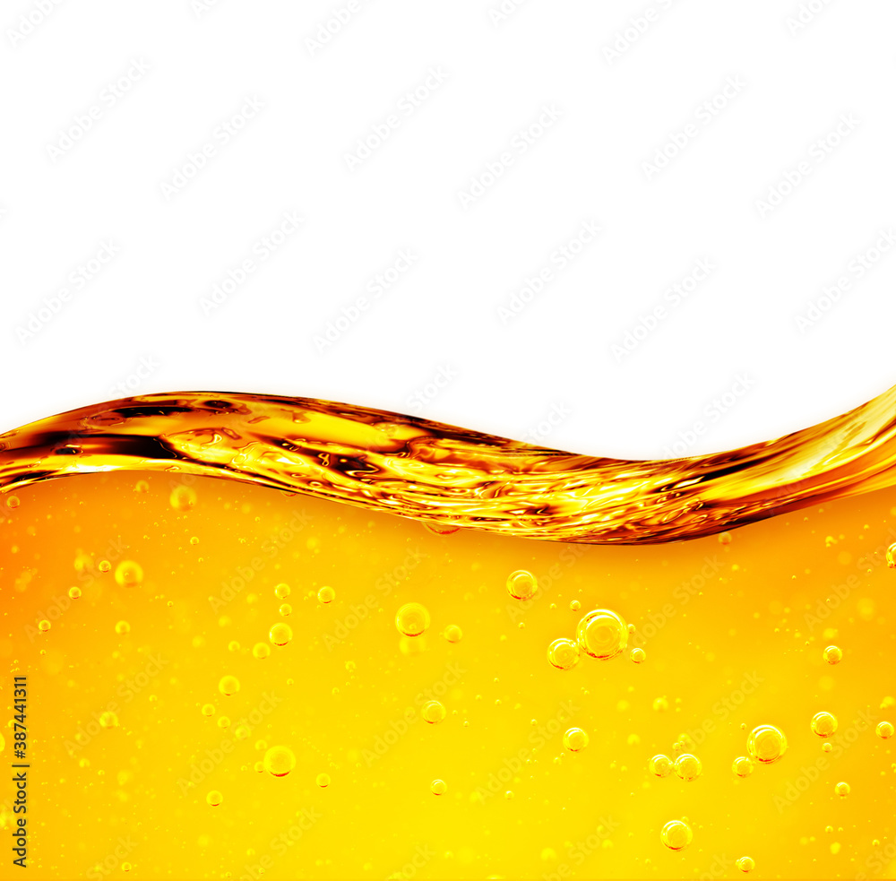 Oil liquid with bubbles. Golden wave on white background. For the ...
