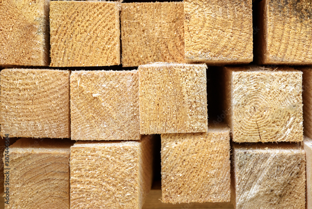 Lumber in sawmill, ends of timber blocks for texture background. Sawed ...